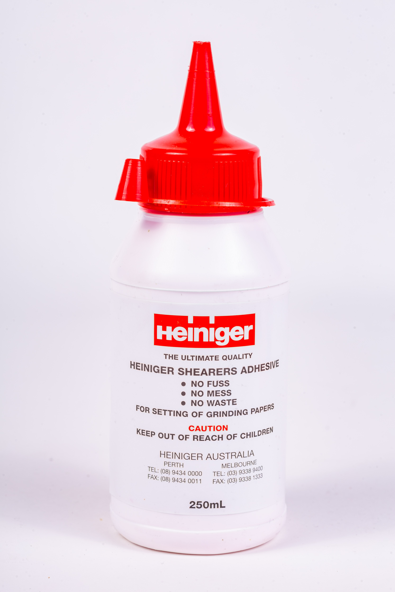 Heiniger Shearing Adhesive 250ml | FarmCo